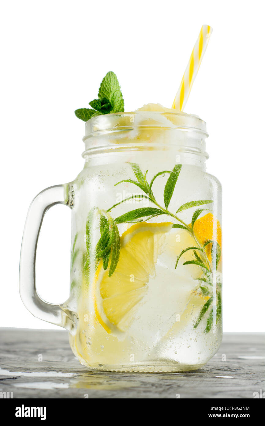 Lemonade. Drink with fresh lemons. Lemon cocktail with juice, mint, ice ...