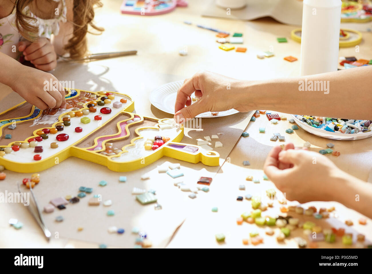 mosaic puzzle art for kids, children's creative game Stock Photo - Alamy
