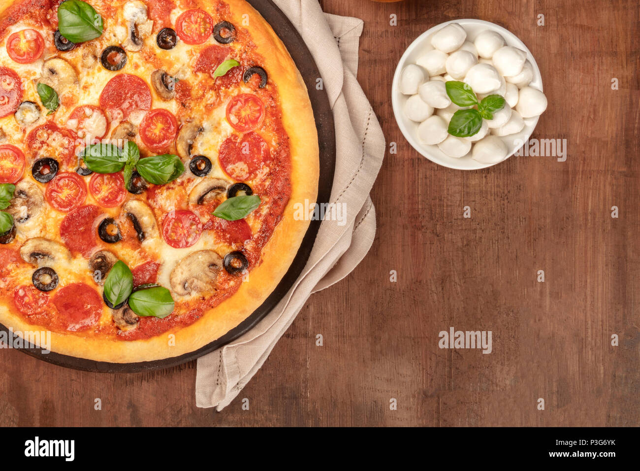 Overhead photo of pepperoni pizza with mozzarellini cheese, shot from ...