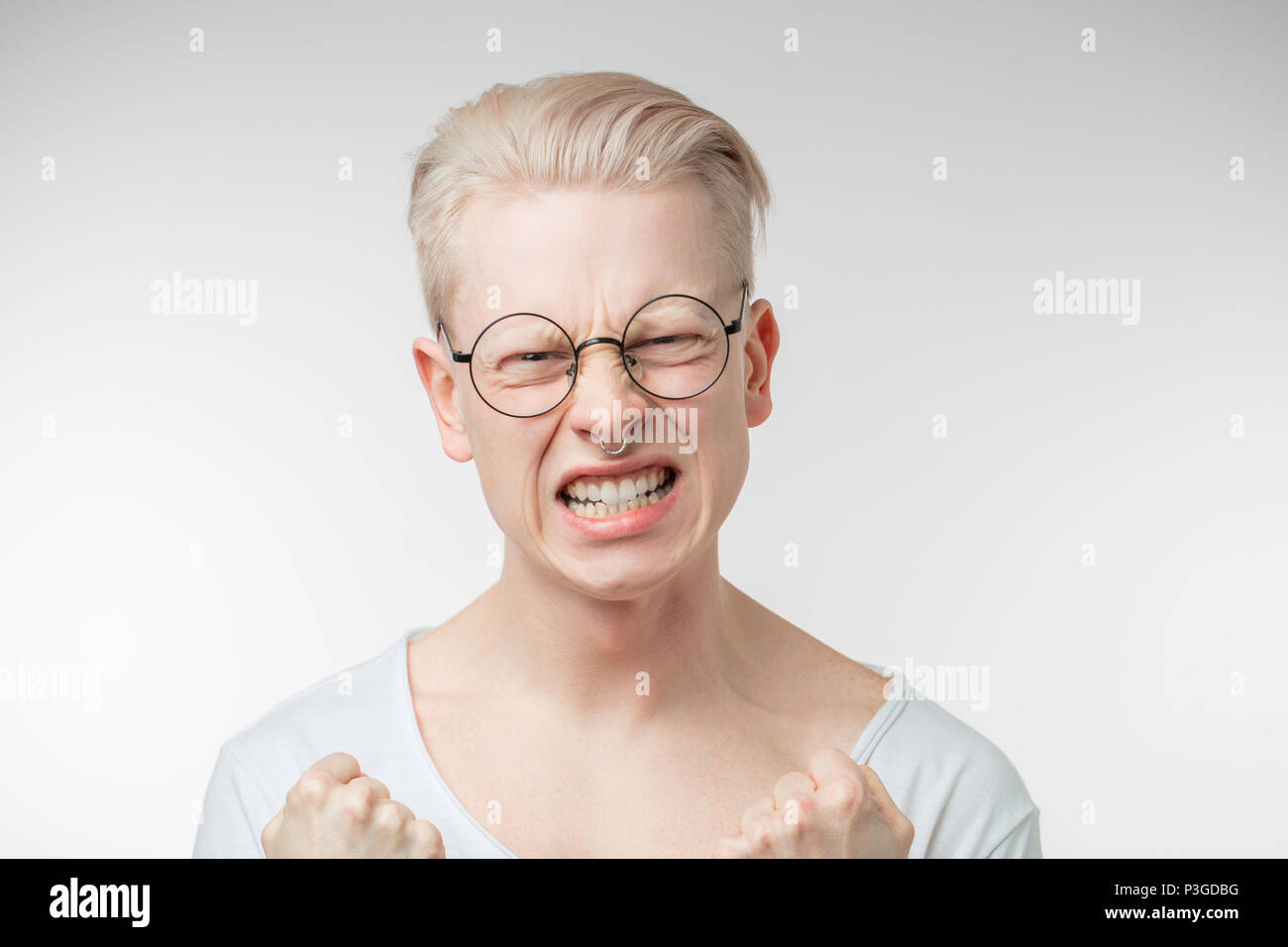 Outraged man gestures angrily, being irritated, outraged Stock Photo ...