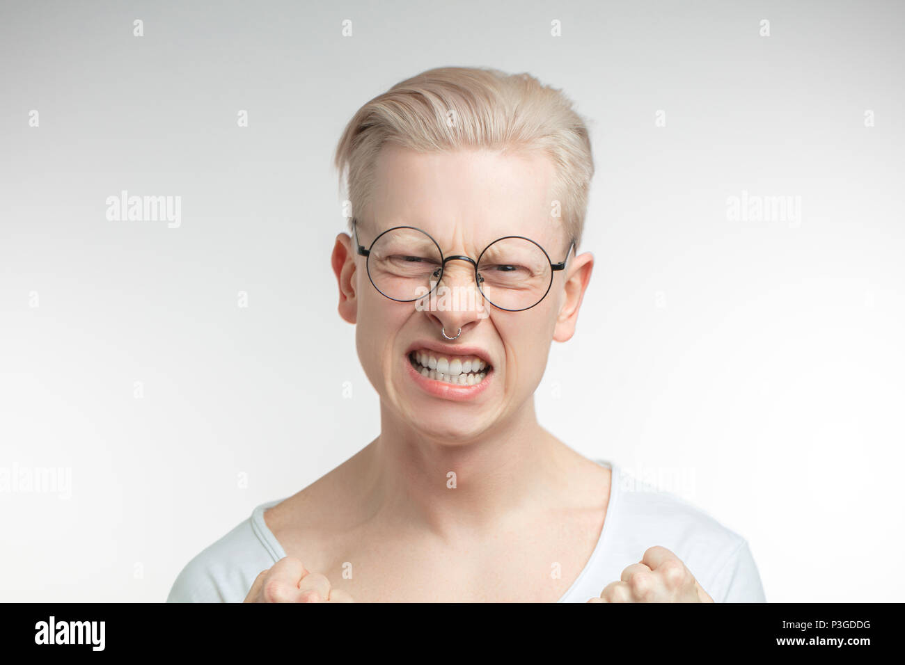 Outraged man gestures angrily, being irritated, outraged Stock Photo ...