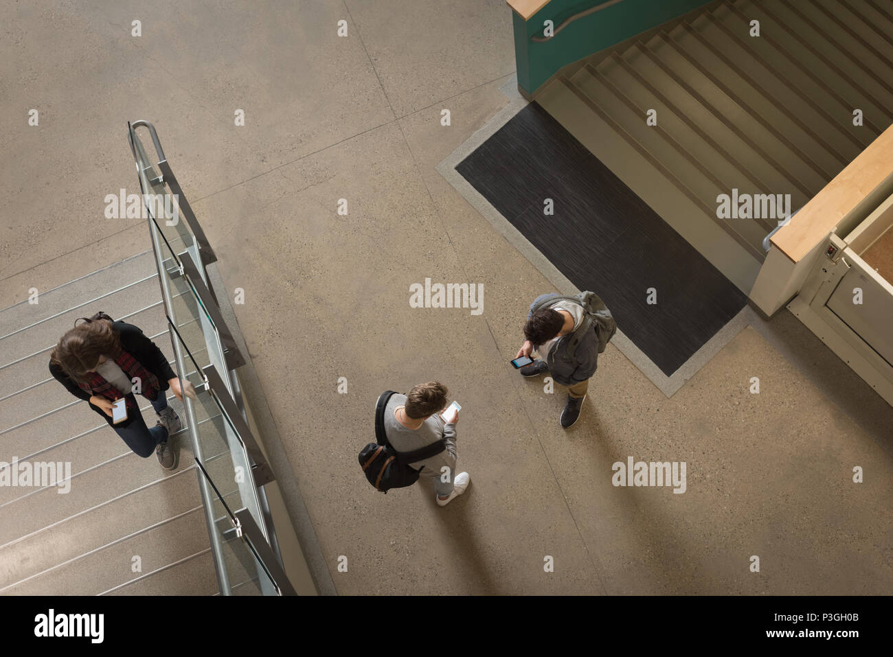 College students using mobile phone Stock Photo - Alamy