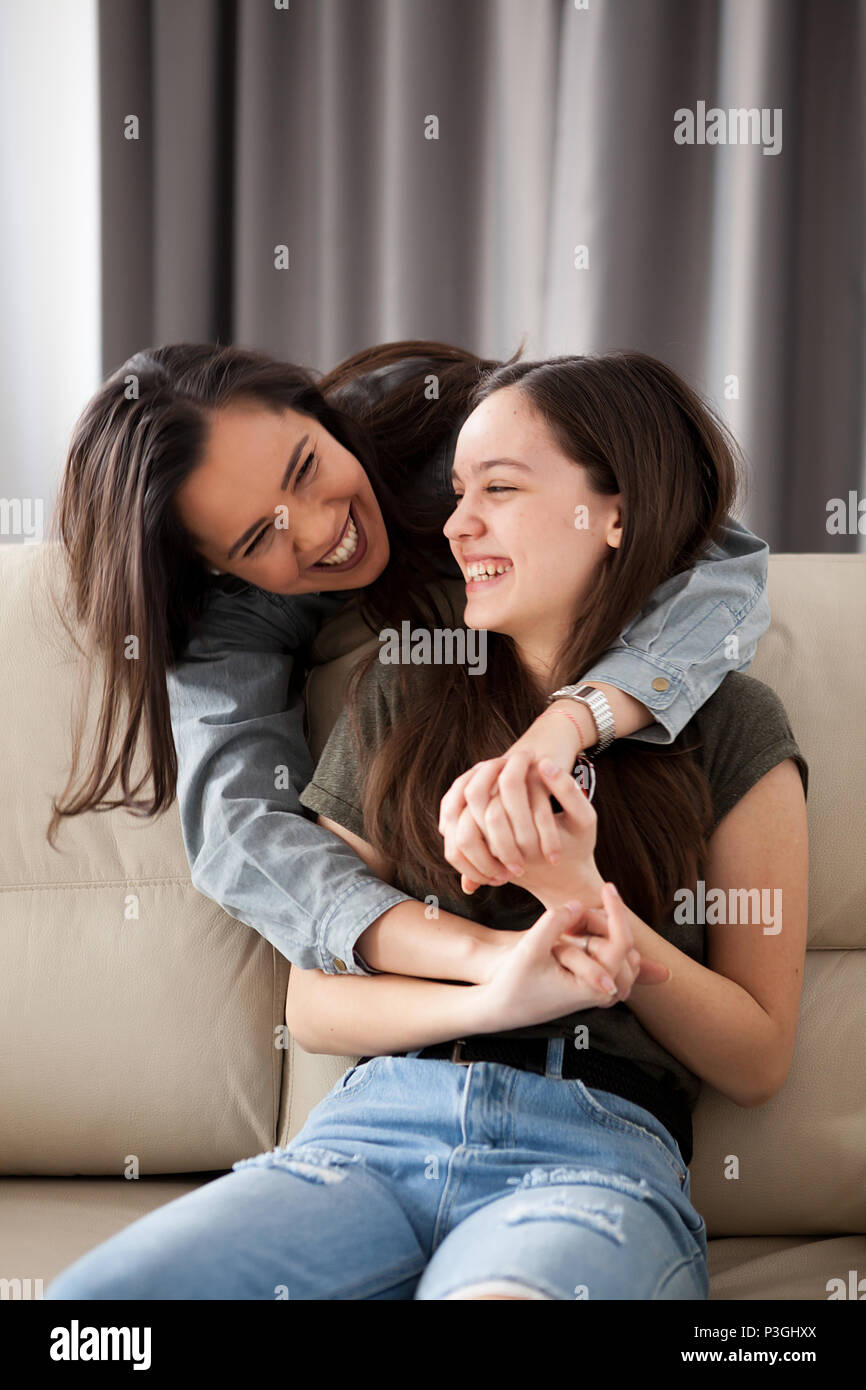 Two happy and fun sisters Stock Photo - Alamy