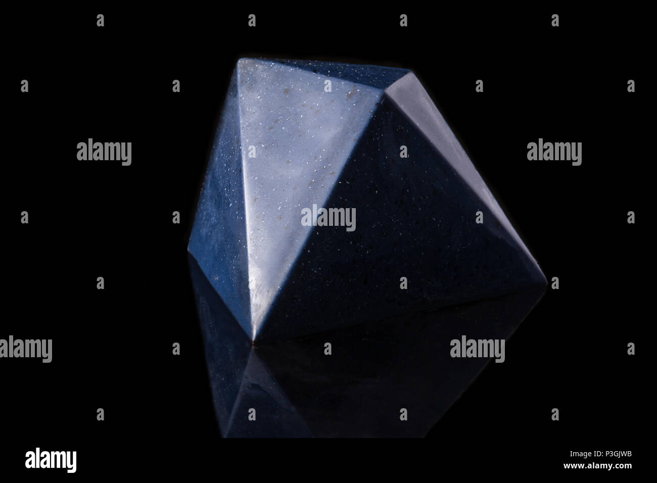 Dark blue luxury handmade chocolate candy on black background ...