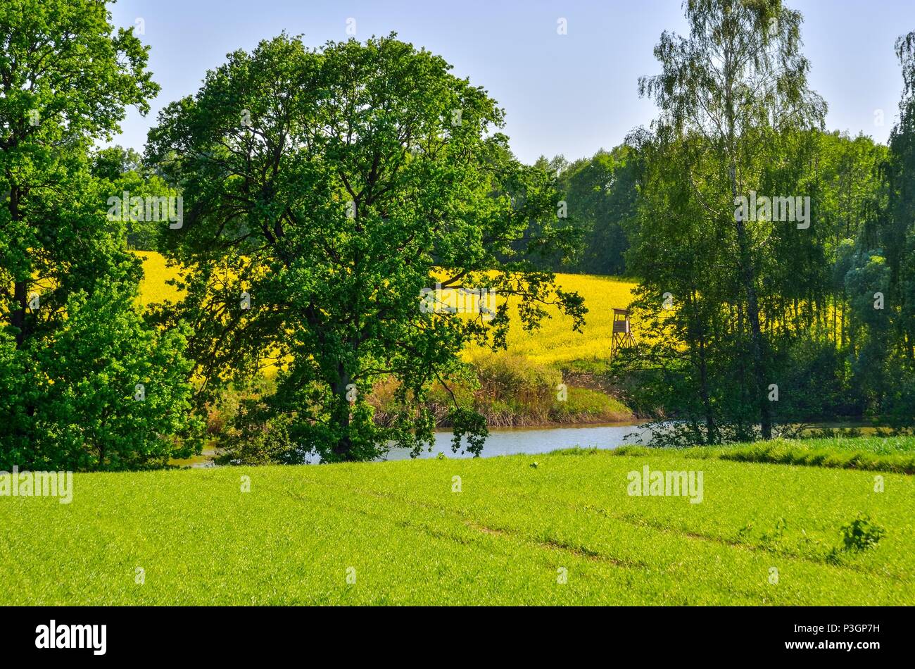 Beautiful spring landscape. Colorful hills above the river in the ...