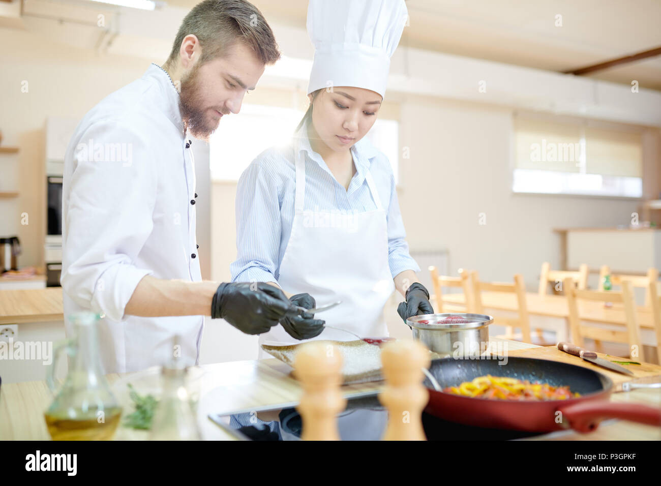 Su-Chef Working in Kitchen Stock Photo - Alamy