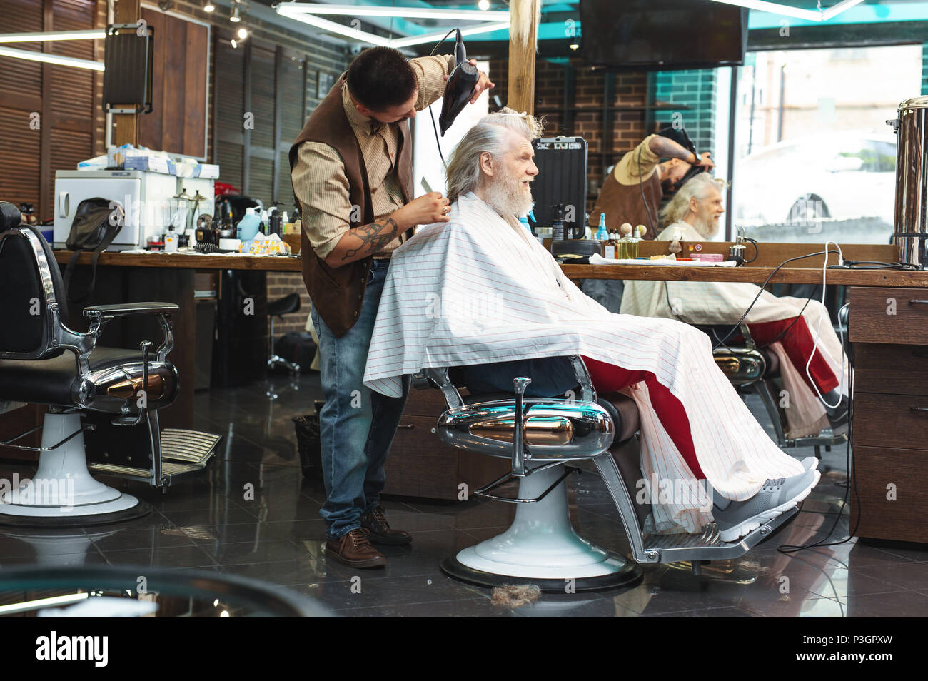 Visiting the barber hi-res stock photography and images - Alamy