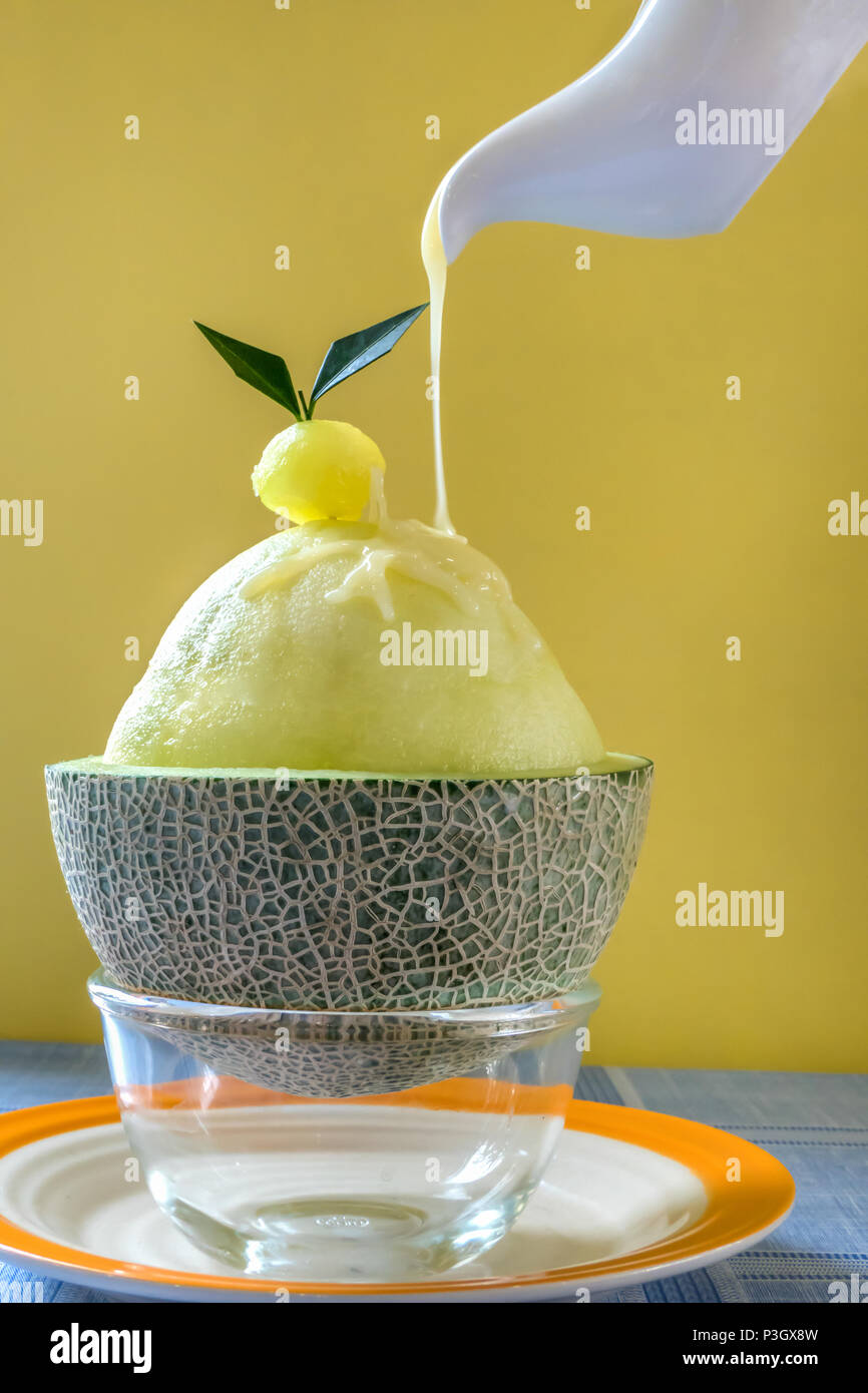 Bingsu - Korean shaved ice dessert with sweet toppings with fresh melon ...