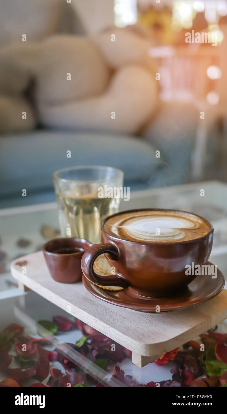 hot coffee cup and hot tea over wooden plate Stock Photo - Alamy