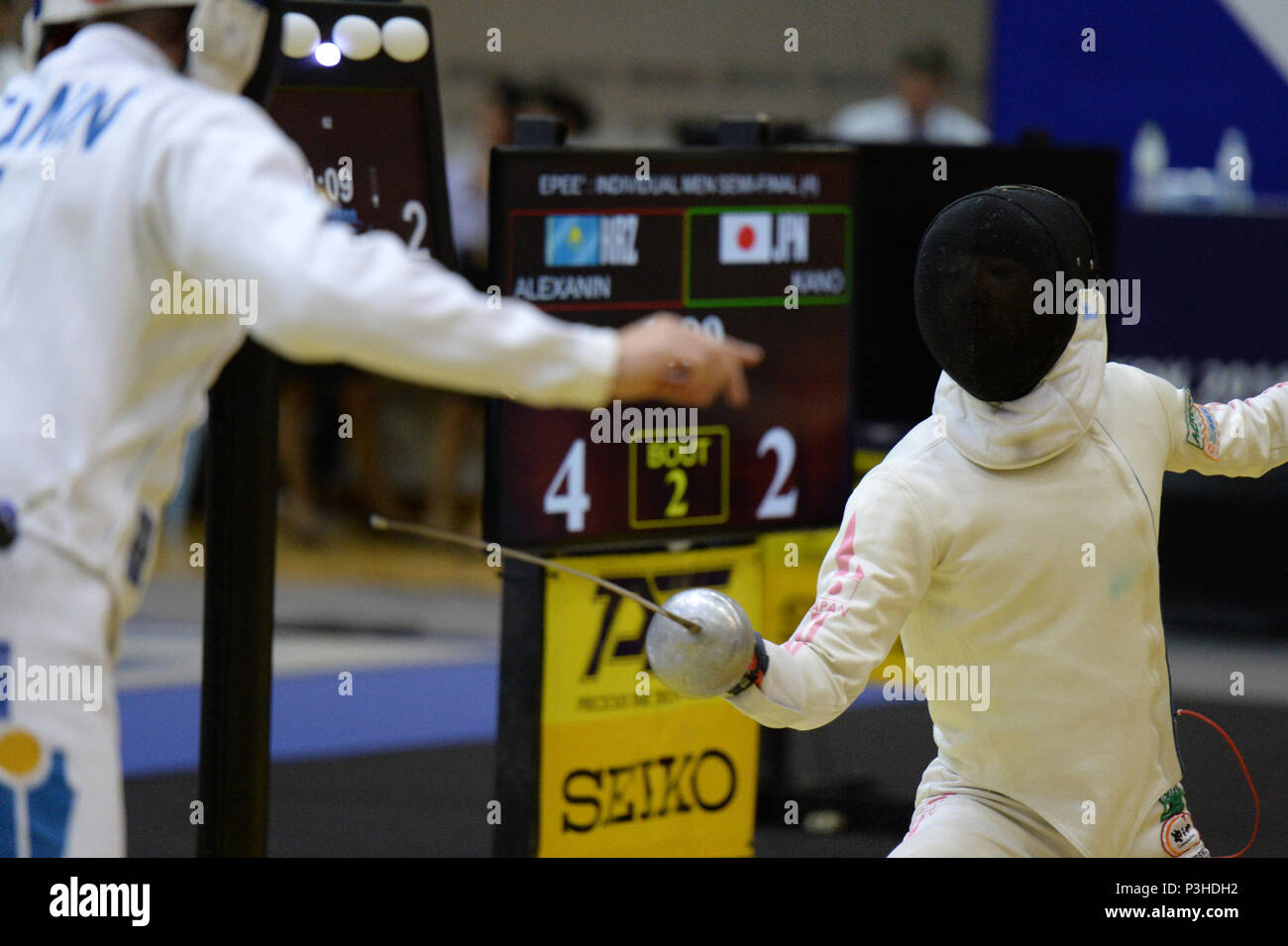 Koki Kano of Japan fights against Dmitriy Alexanin of Kazakhstan at the ...