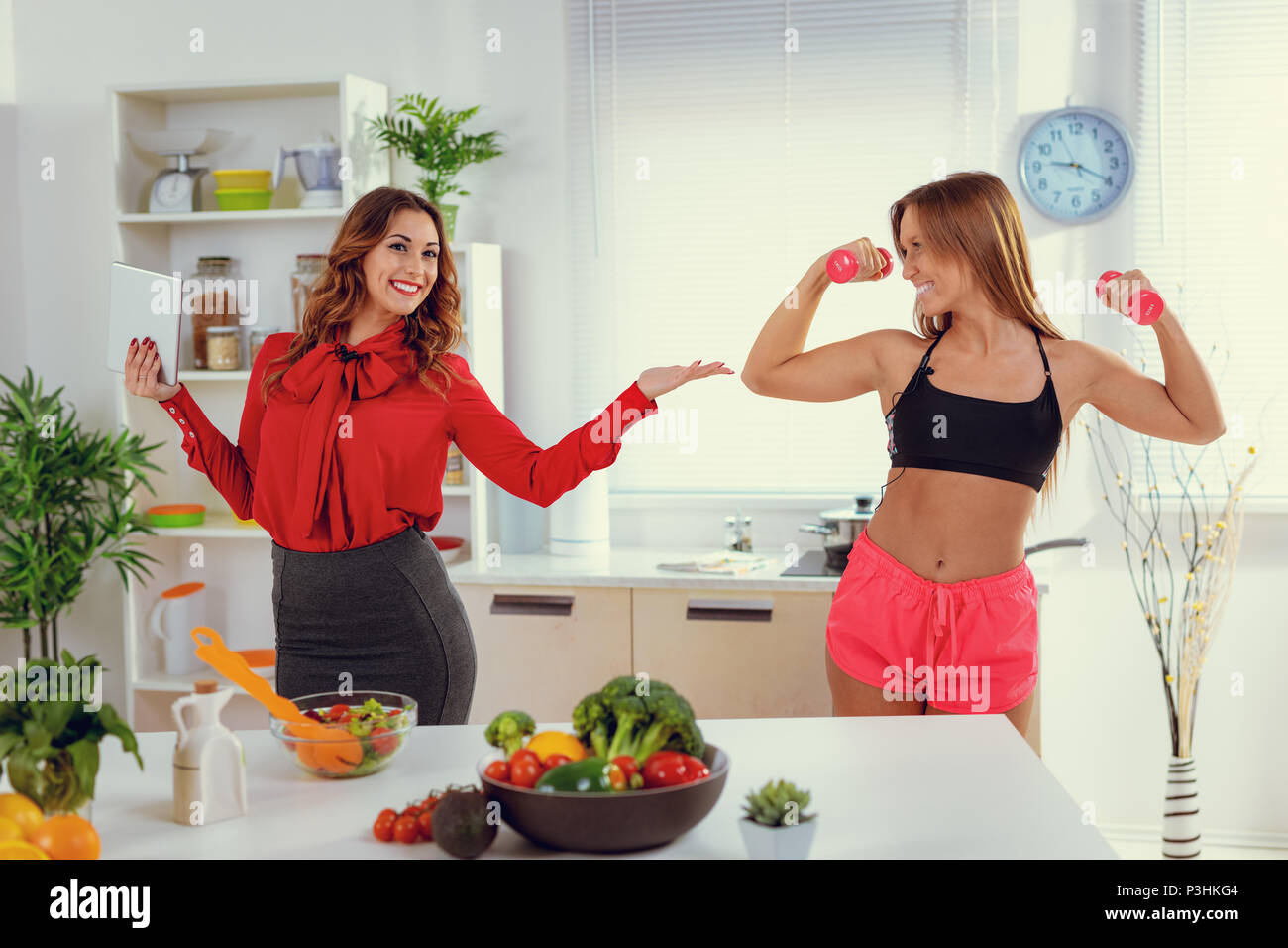 Attractive fitness girls keeping their daily blog and telling their ...
