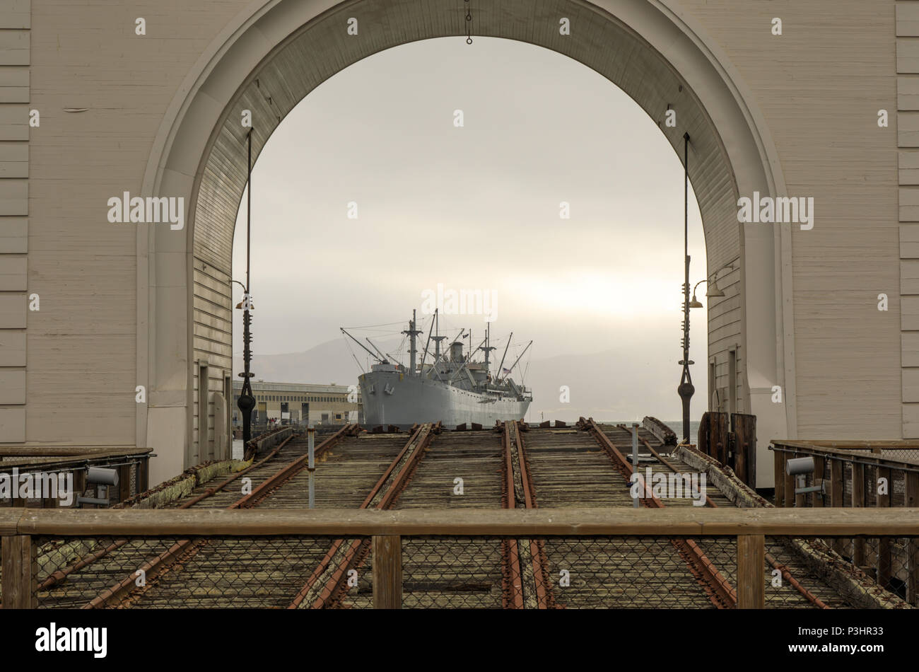 SS Jeremiah O'Brien war ship ruins through Pier 39 Ferry Arch Stock ...