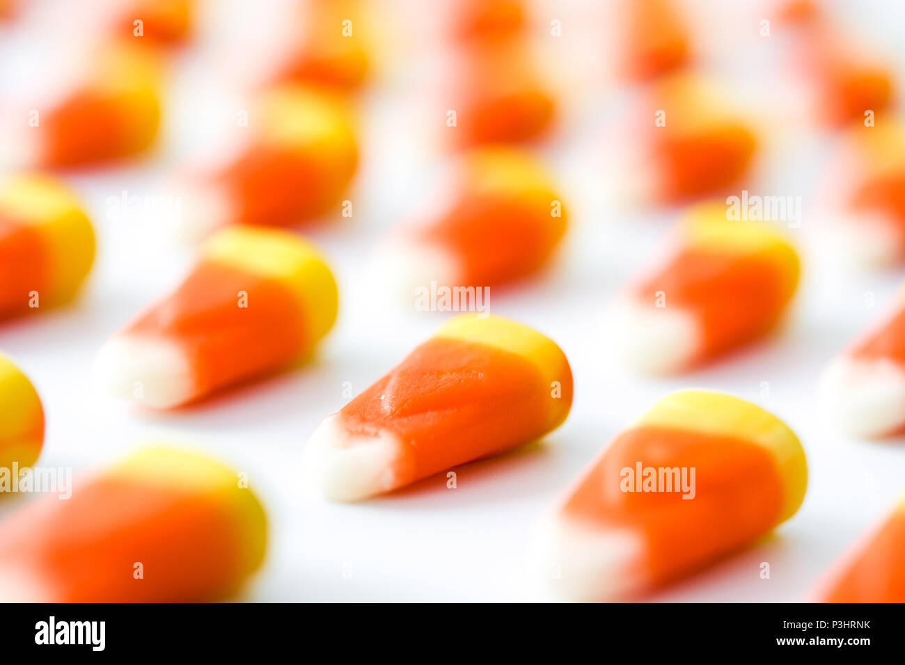 Typical halloween candy corn pattern isolated on white background Stock ...