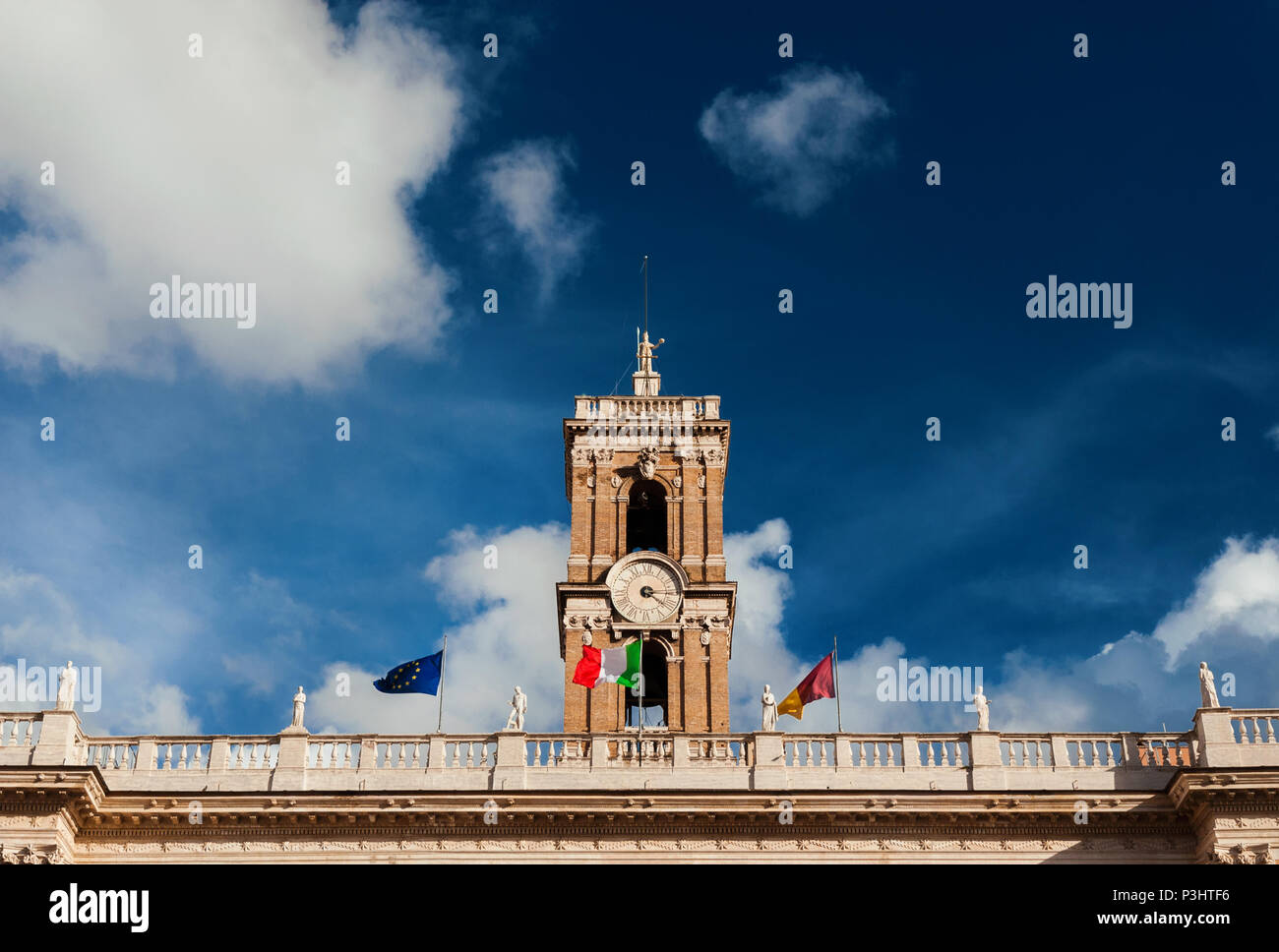 Rome City Hall Bell Tower among clouds at the top of Capitoline Hill in ...