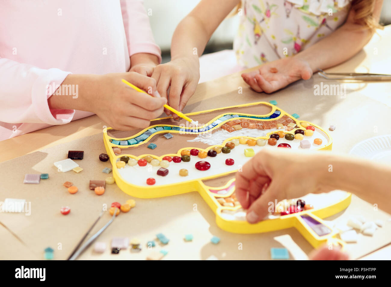 mosaic puzzle art for kids, children's creative game Stock Photo - Alamy