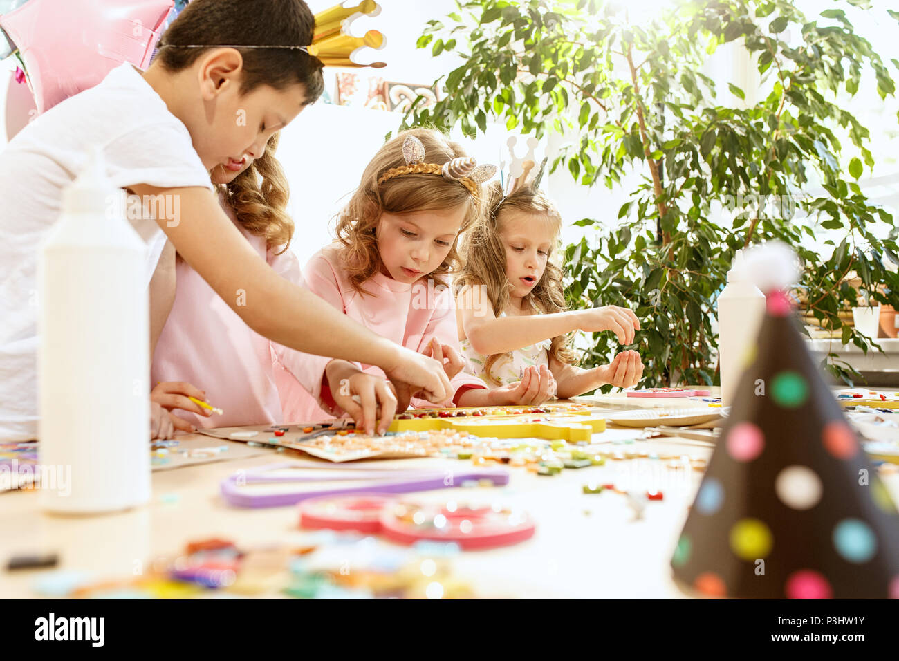 mosaic puzzle art for kids, children's creative game Stock Photo - Alamy