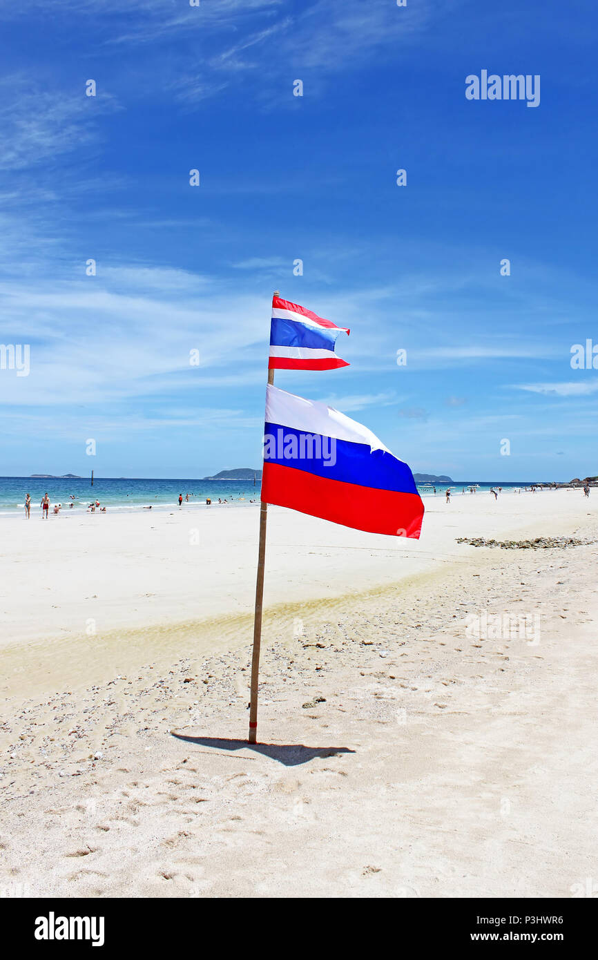 Flags on Koh Larn beach. More than 5,000 people daily are in Koh Larn ...
