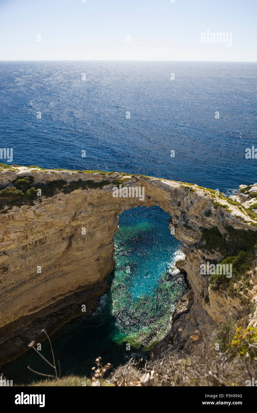 The spectacular Tripitos Arch on the rugged SW coast of Paxos, Greece ...