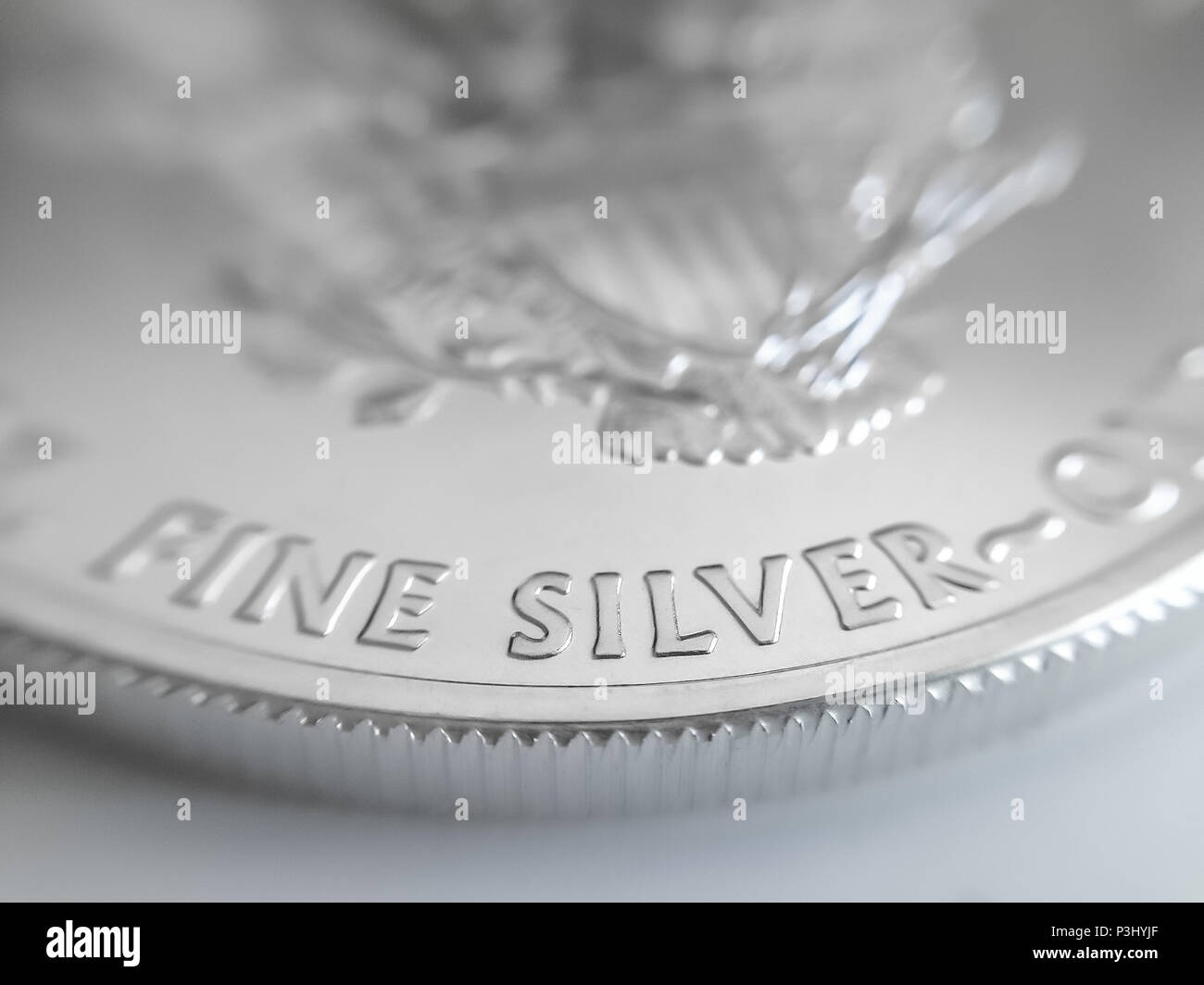 Macro close up of a silver Bullion coin Stock Photo - Alamy
