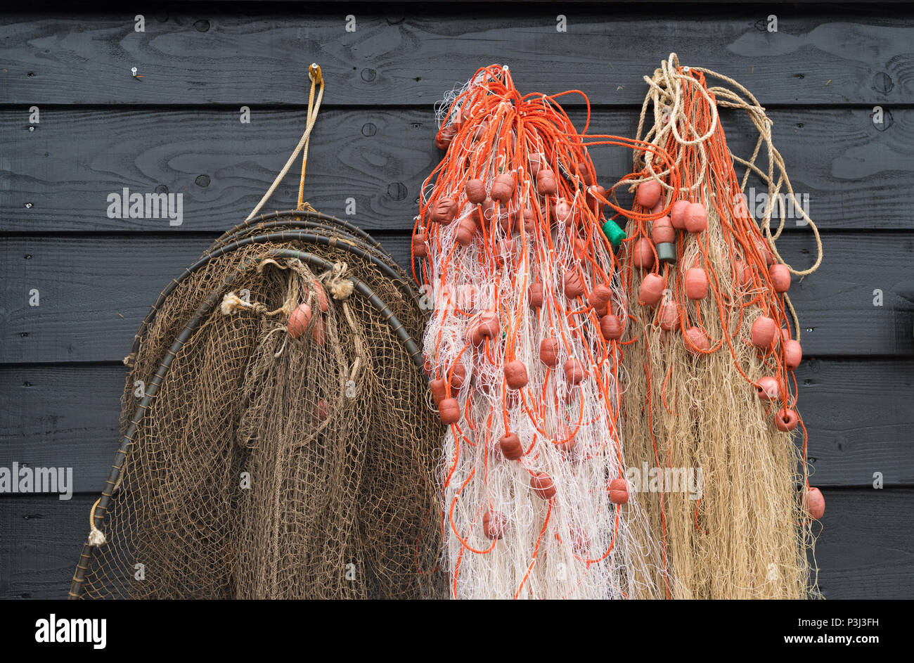 Fishing net hanging on a wall hi-res stock photography and images - Alamy