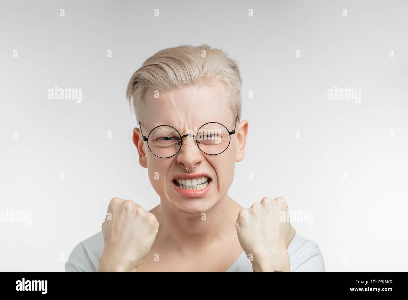 Outraged man gestures angrily, being irritated, outraged Stock Photo ...