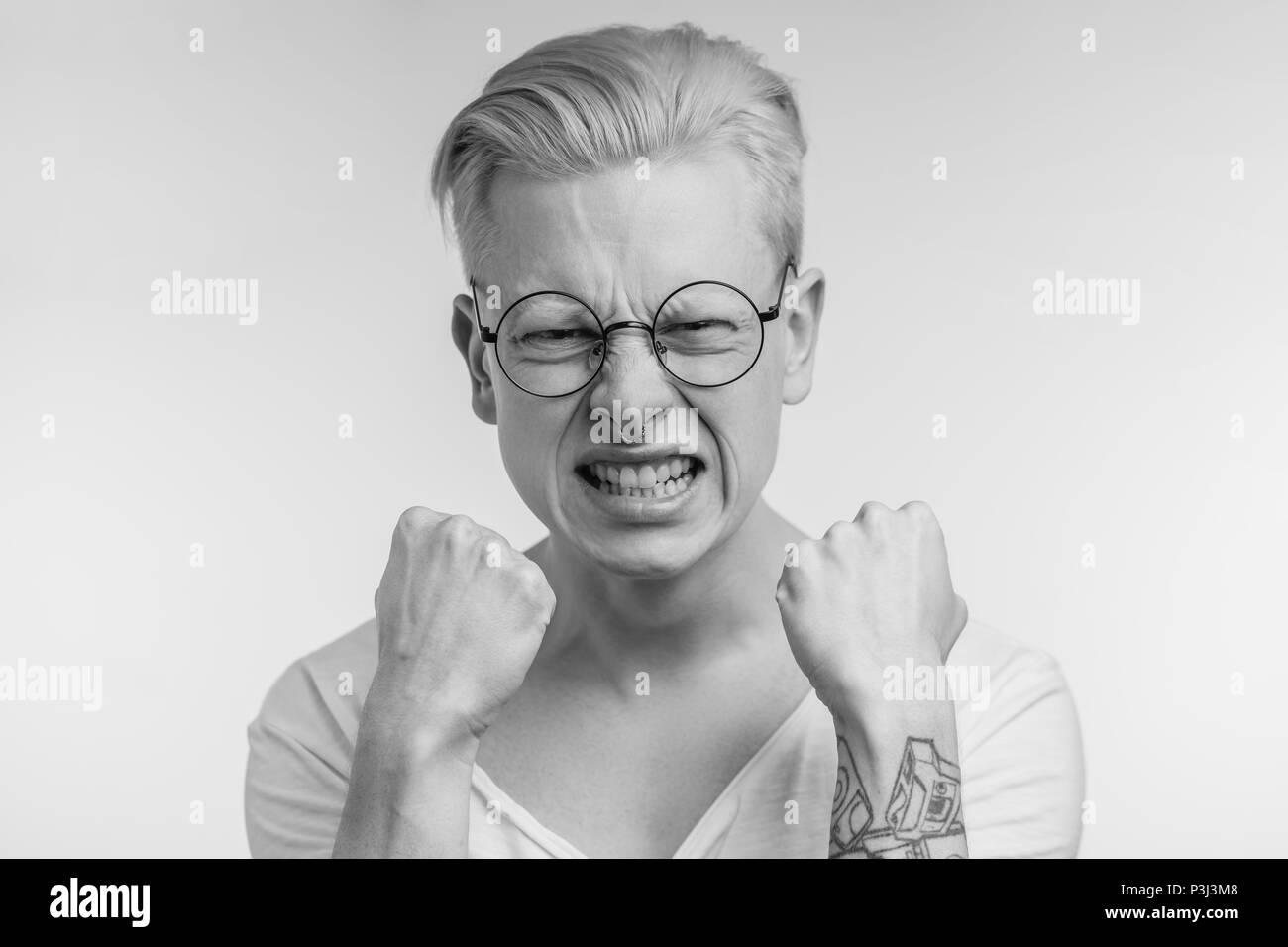 Outraged man gestures angrily, being irritated, outraged Stock Photo ...