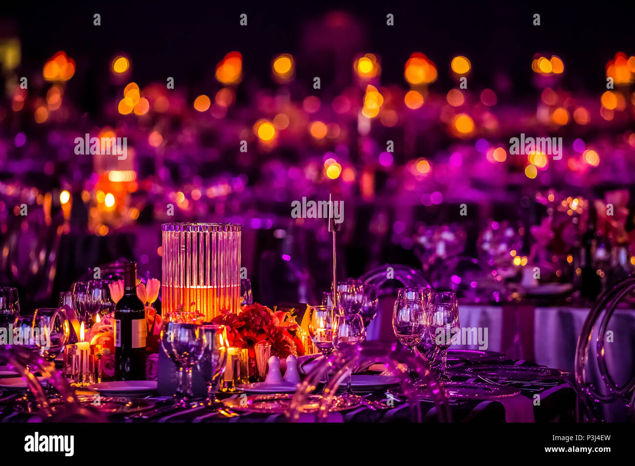 Pink and Purple Decor for corporate gala dinner banquet event Stock ...