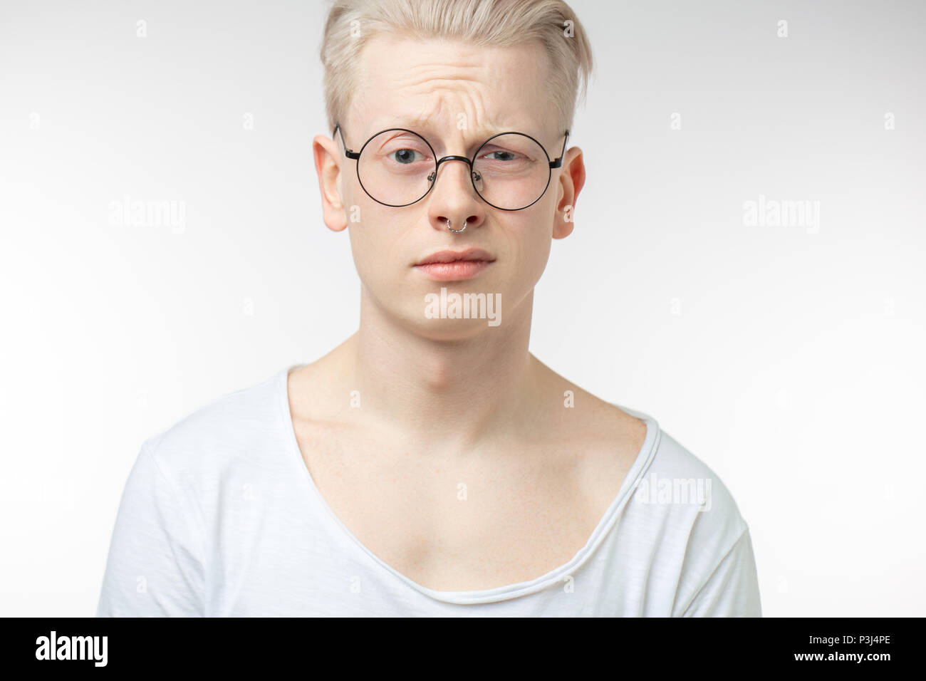 doubt, expression and people concept - man thinking over gray ...