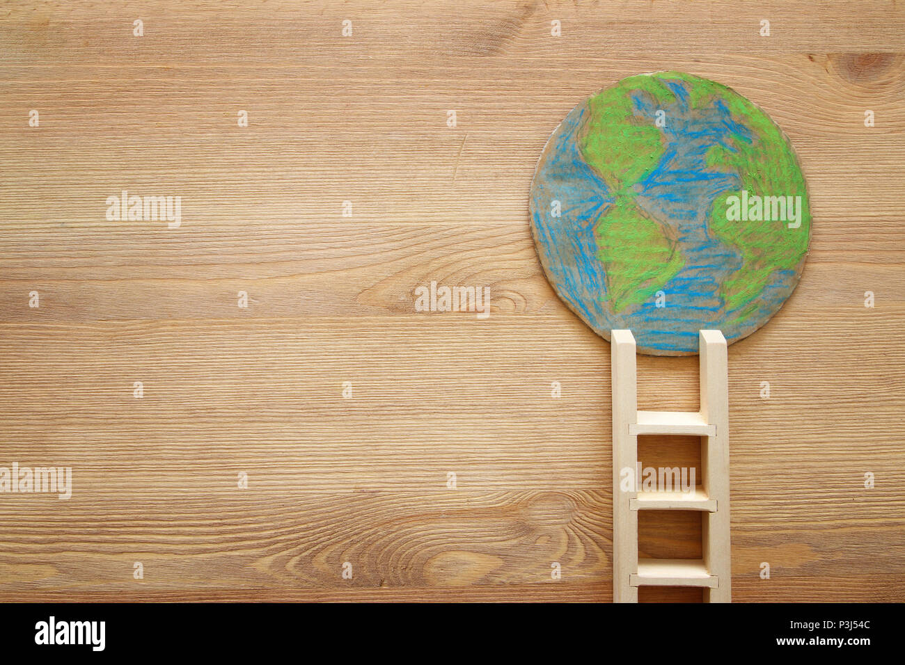 top view image of earth globe and ladder over wooden background Stock ...