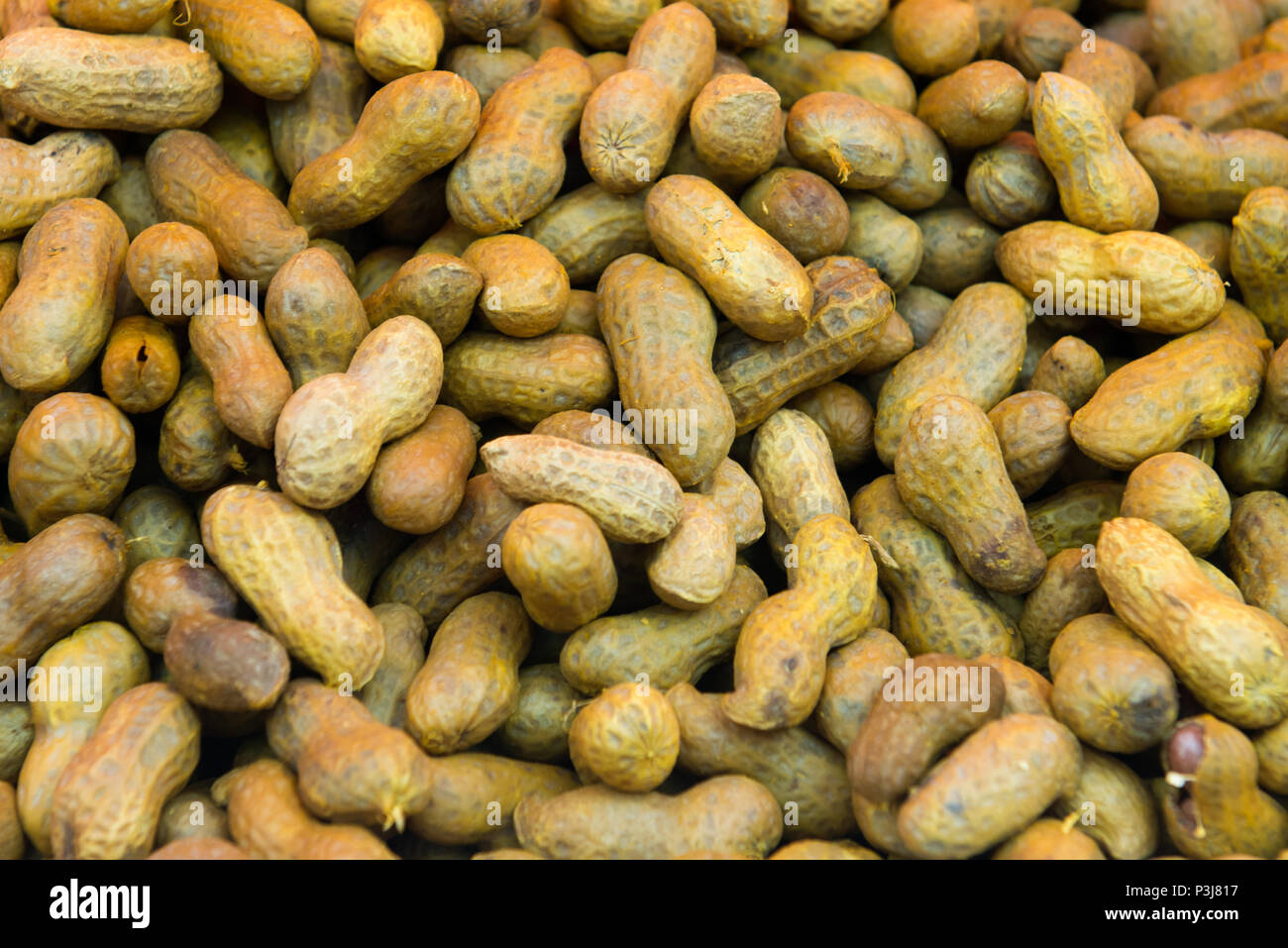 Steam roasted peanuts on a market Stock Photo - Alamy