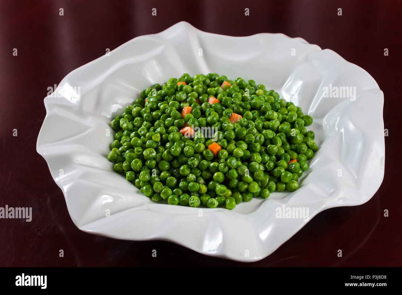 Stir fried peas Stock Photo - Alamy
