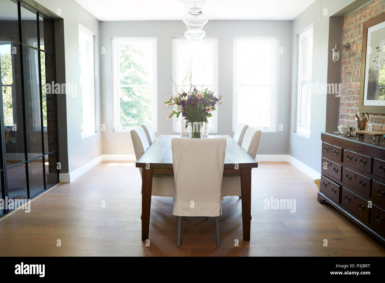 Modern furnished domestic dining room, without people Stock Photo - Alamy