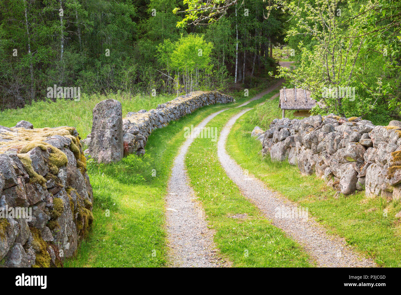 Gravel road with stone walls hi-res stock photography and images - Alamy