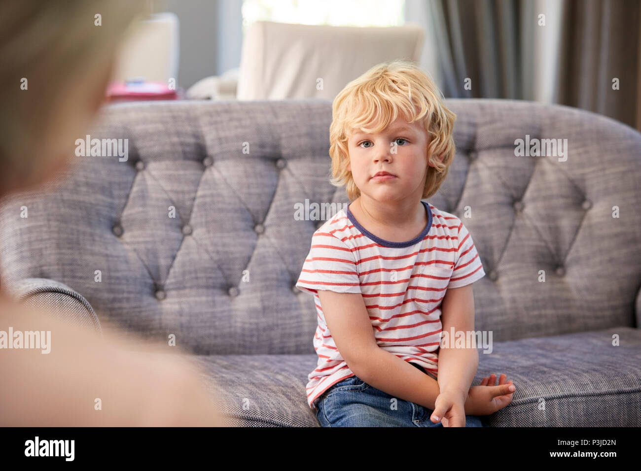 Young boy having therapy with a child psychologist Stock Photo - Alamy
