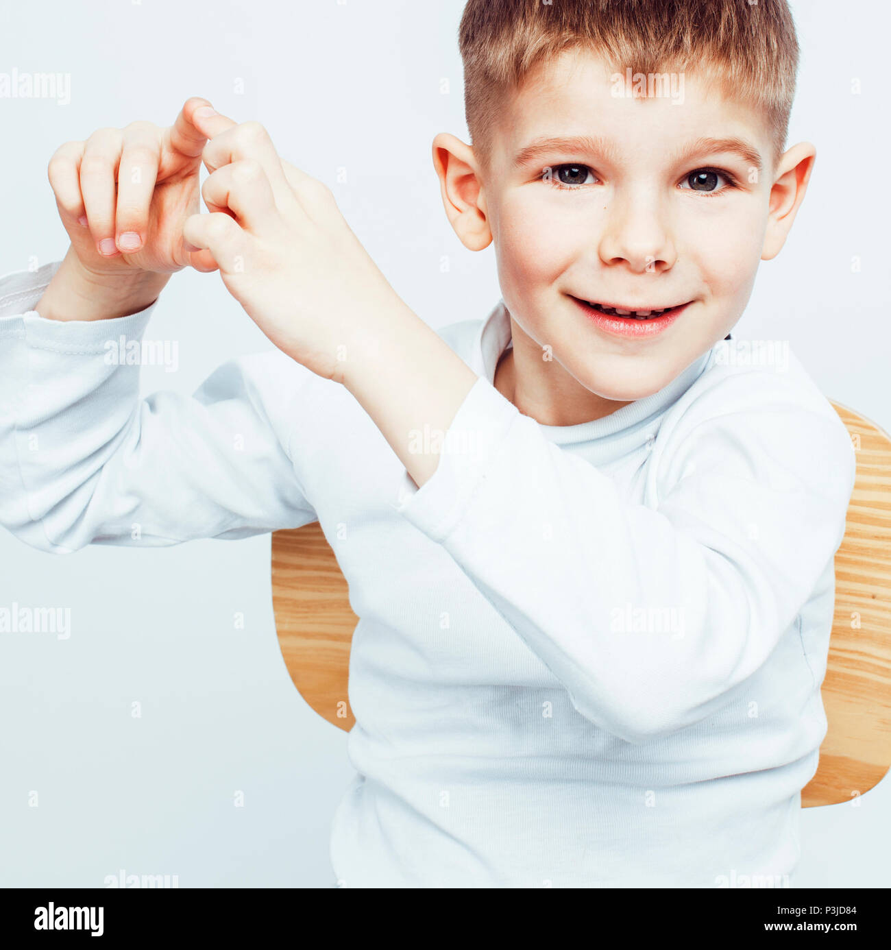 little cute real boy on white background gesture smiling close u Stock ...