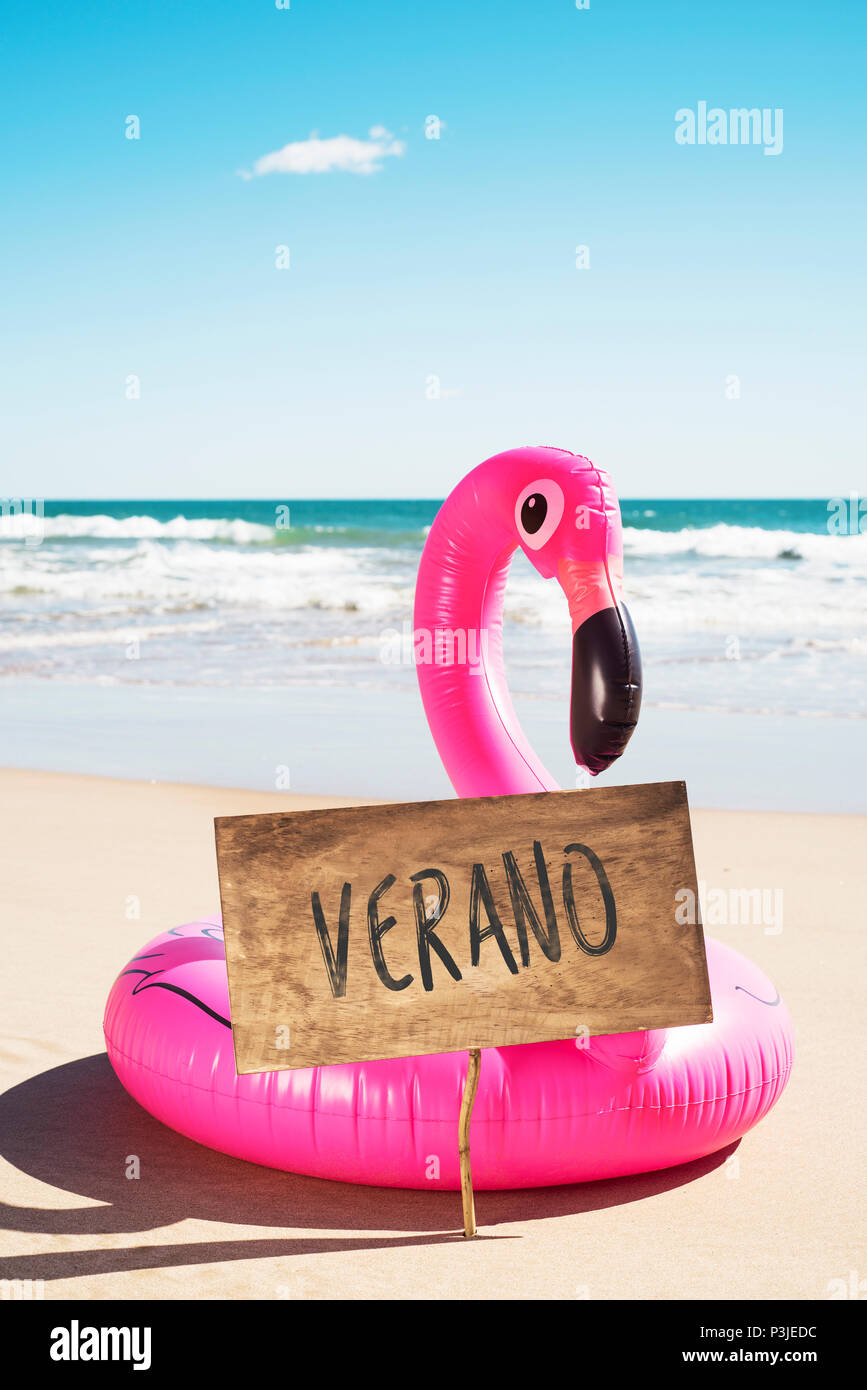 a rustic signboard with the text “verano”, “summer” written in spanish ...