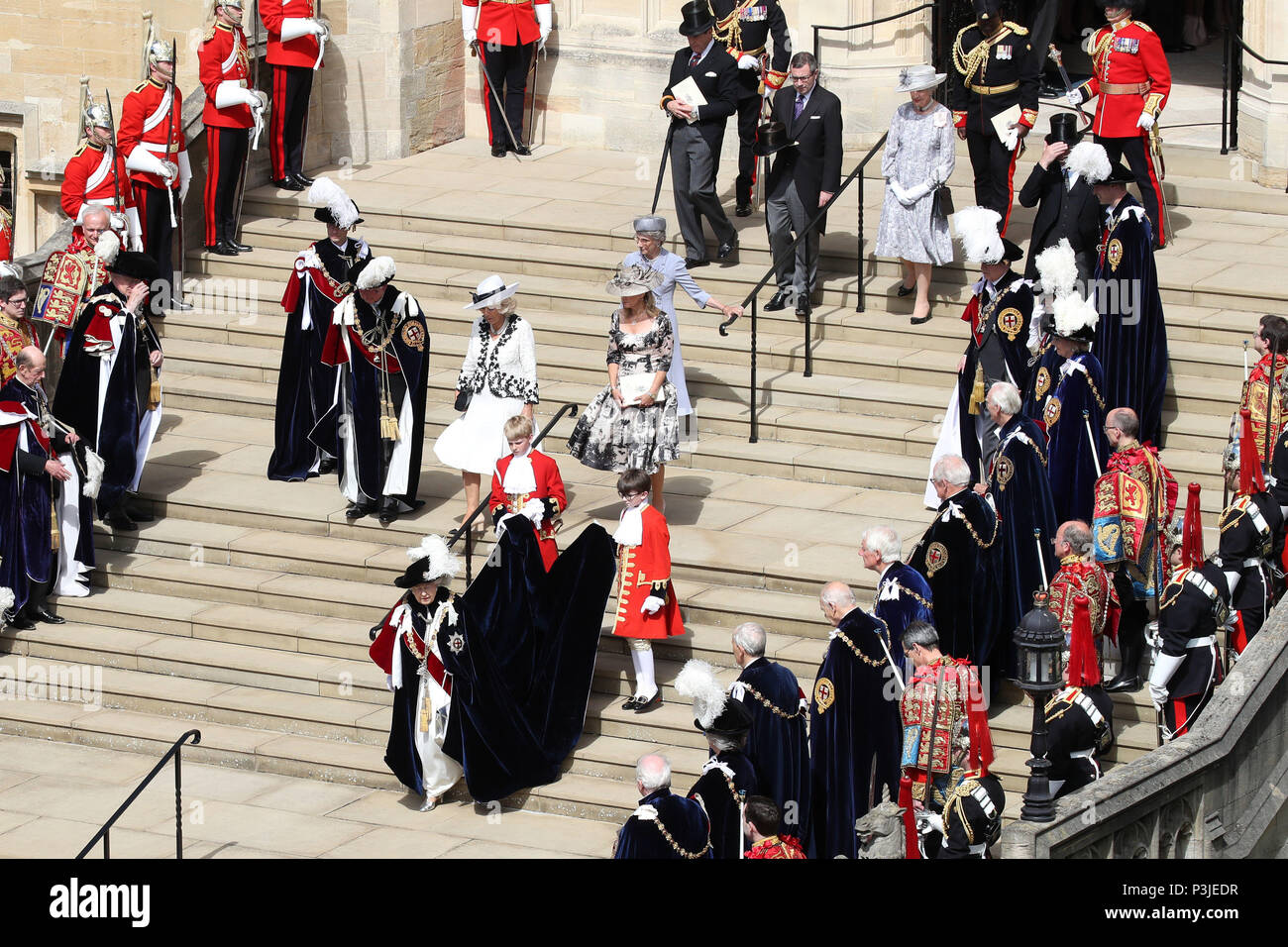 Queen Elizabeth II walks down the steps to her carriage during the ...