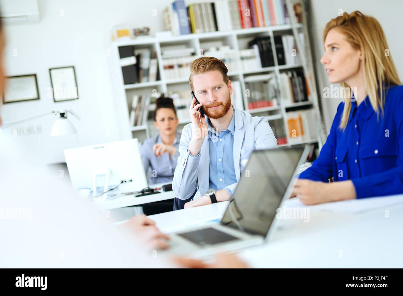 Business people using devices Stock Photo - Alamy