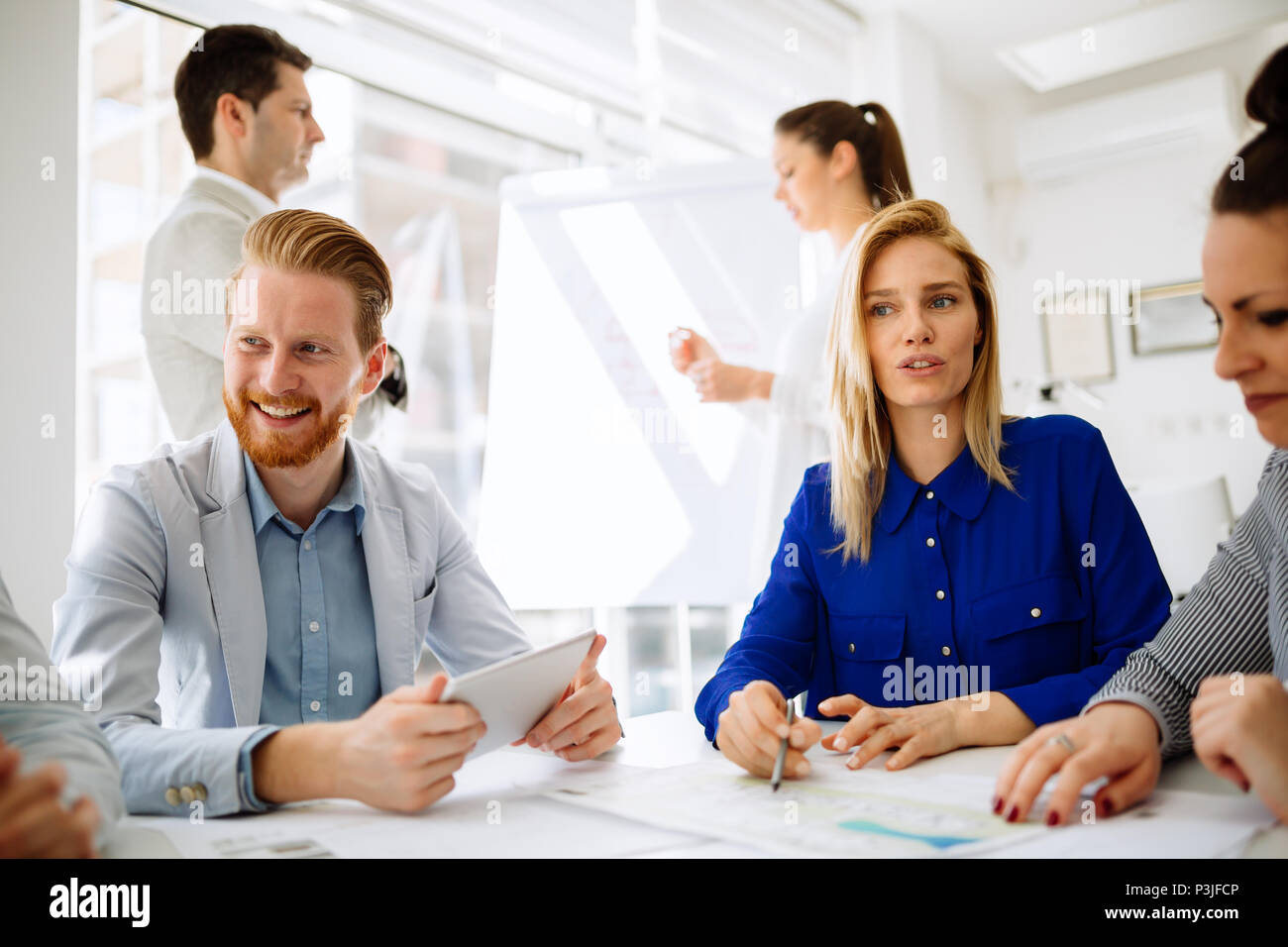 Happy smiling business people team hi-res stock photography and images ...