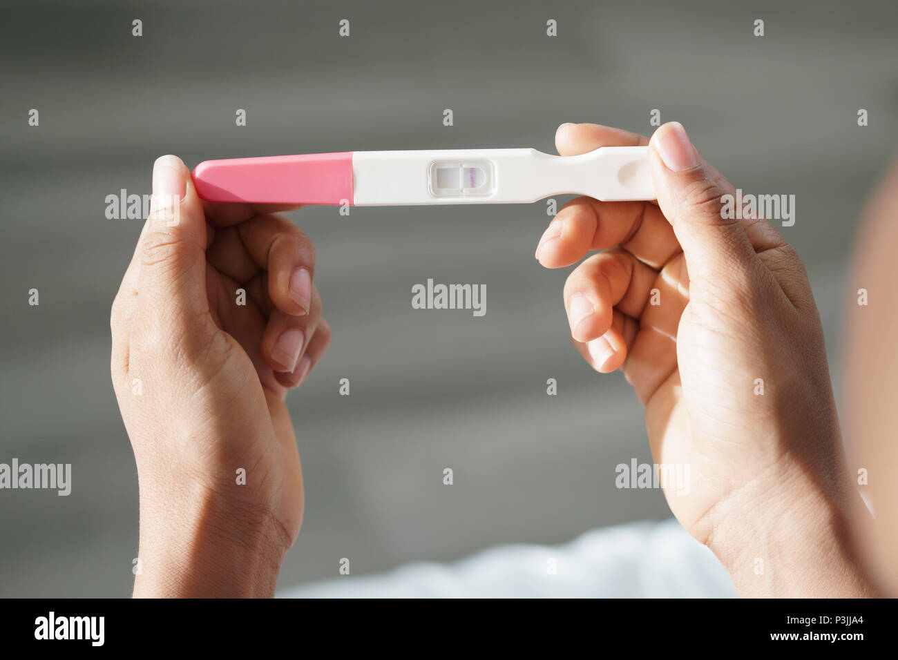 African american girl holding pink hi-res stock photography and images ...
