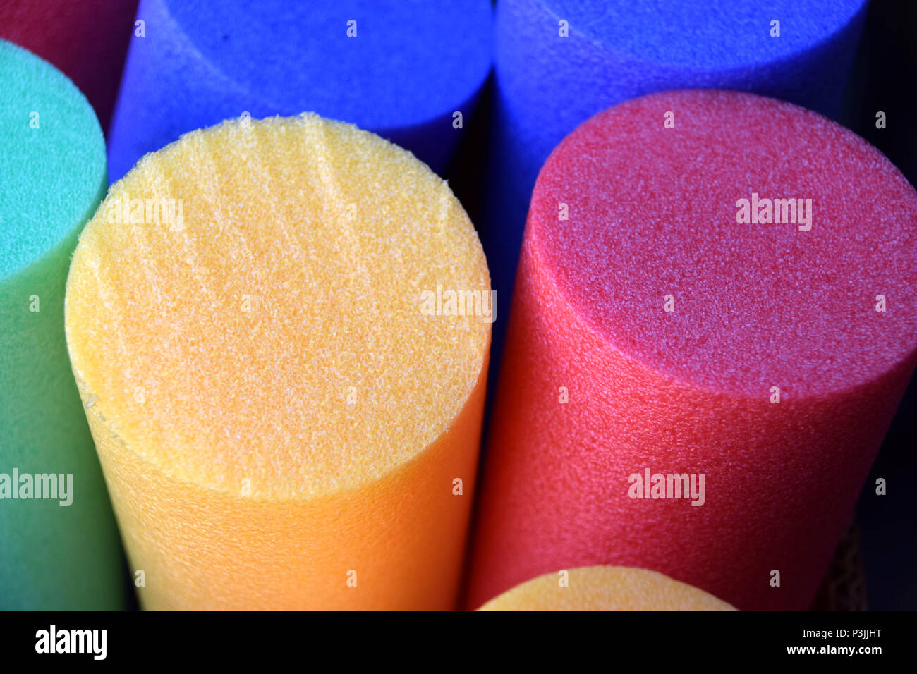 aqua noodles for gym or bathing, different colors pool noodles Stock ...