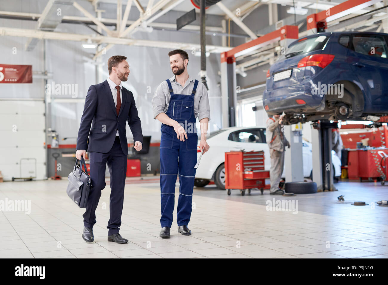 Businessman in Car Service Stock Photo - Alamy