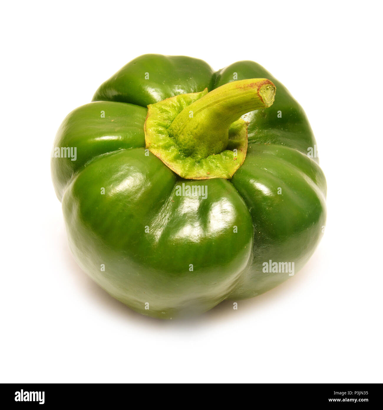 green flat pepper isolated on white Stock Photo - Alamy