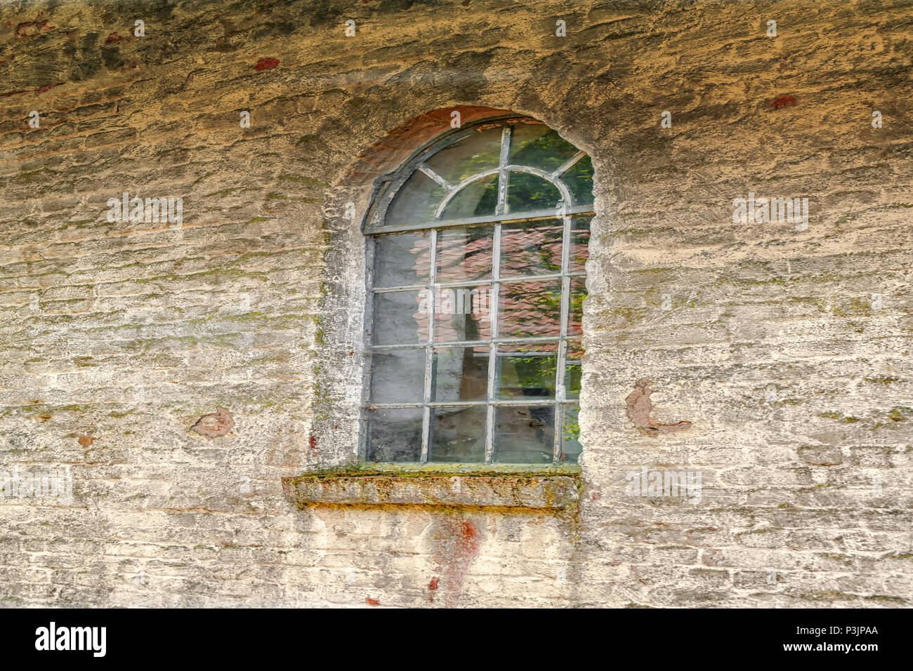 Historic old cast-windows in an old abandoned factory Stock Photo - Alamy