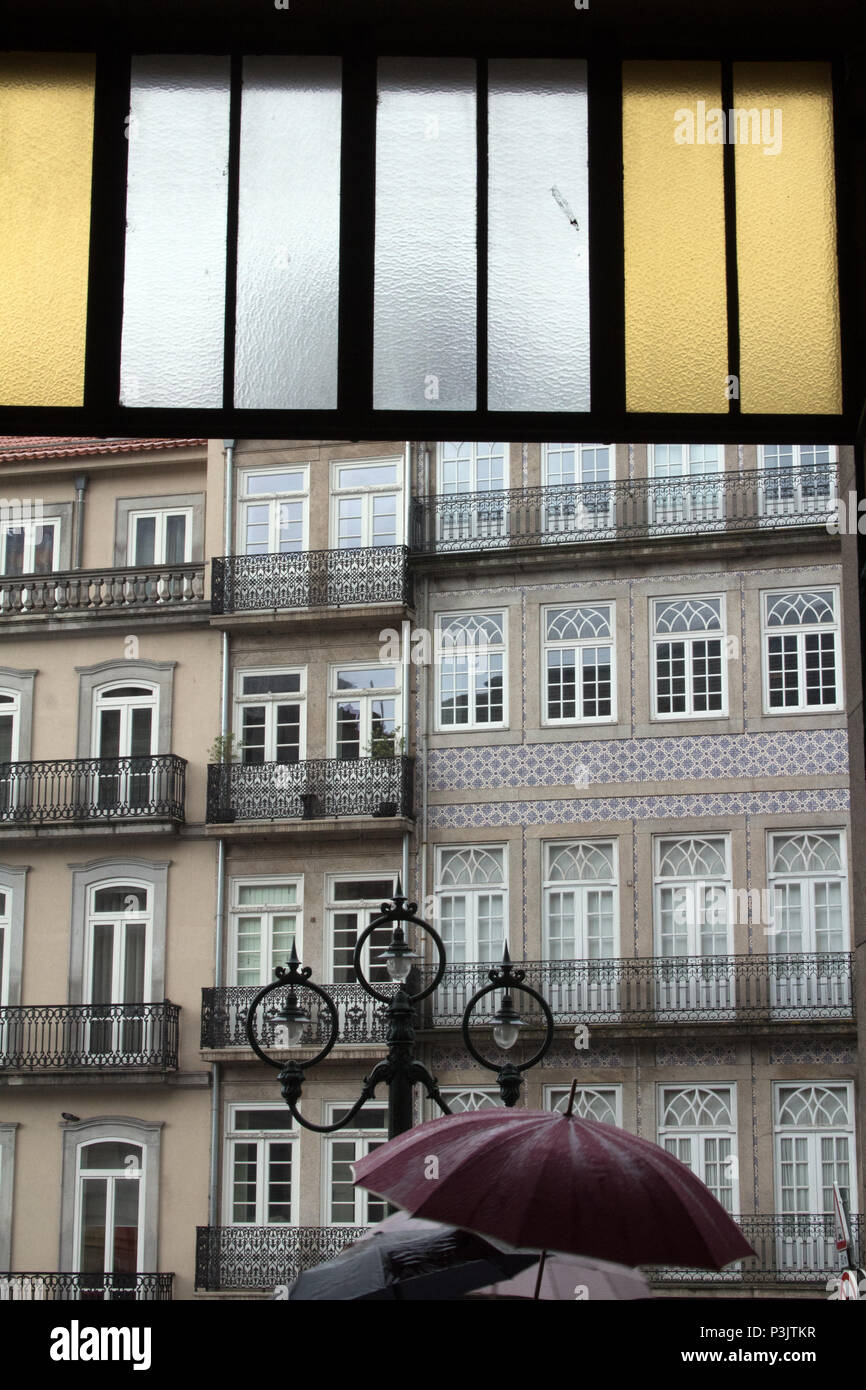 Traditional azulejo tiles on terraced houses in the historic centre of ...