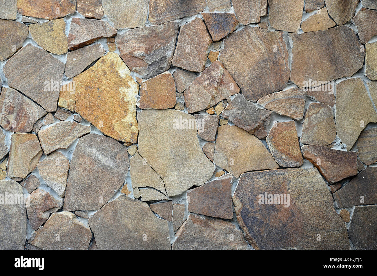 Stone wall background - building feature. Texture of thick and strong ...