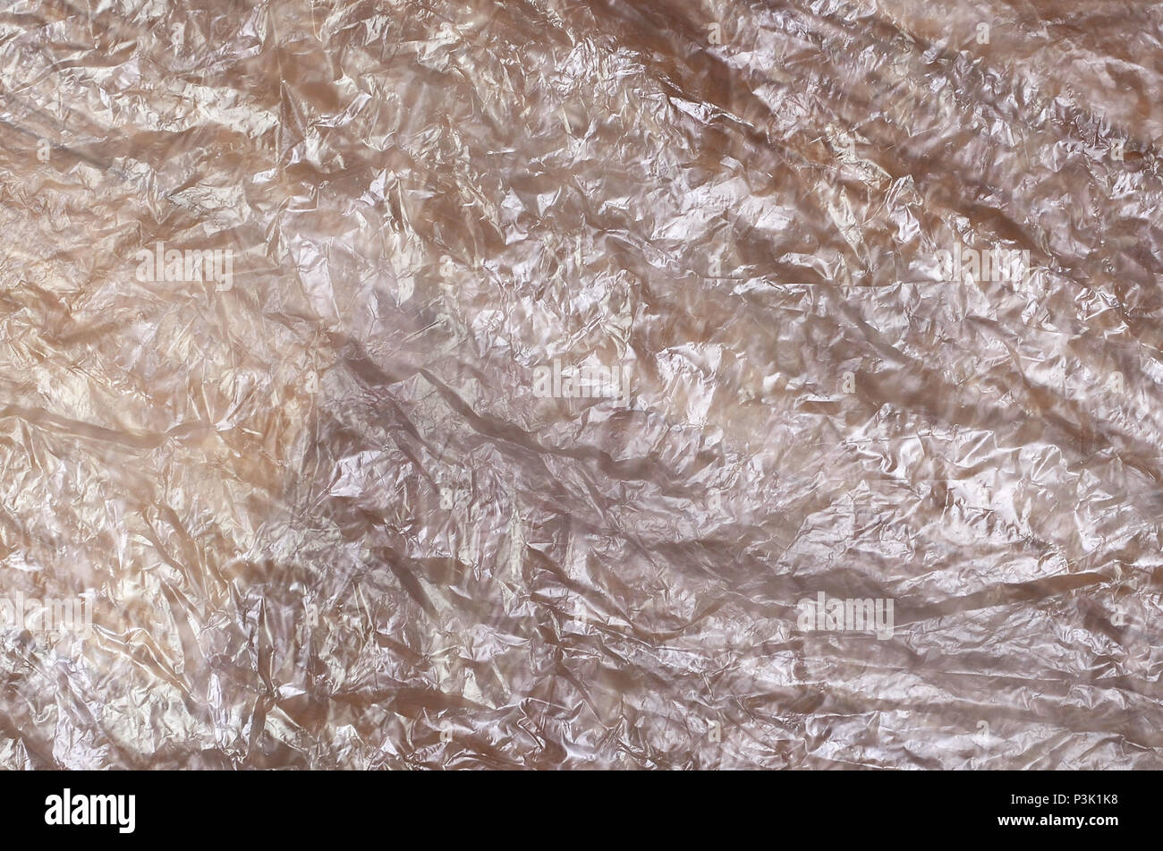 Texture of white crumpled cellophane surface transparent on sunlight ...
