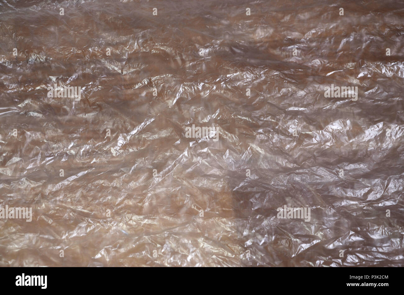 Texture of white crumpled cellophane surface transparent on sunlight ...