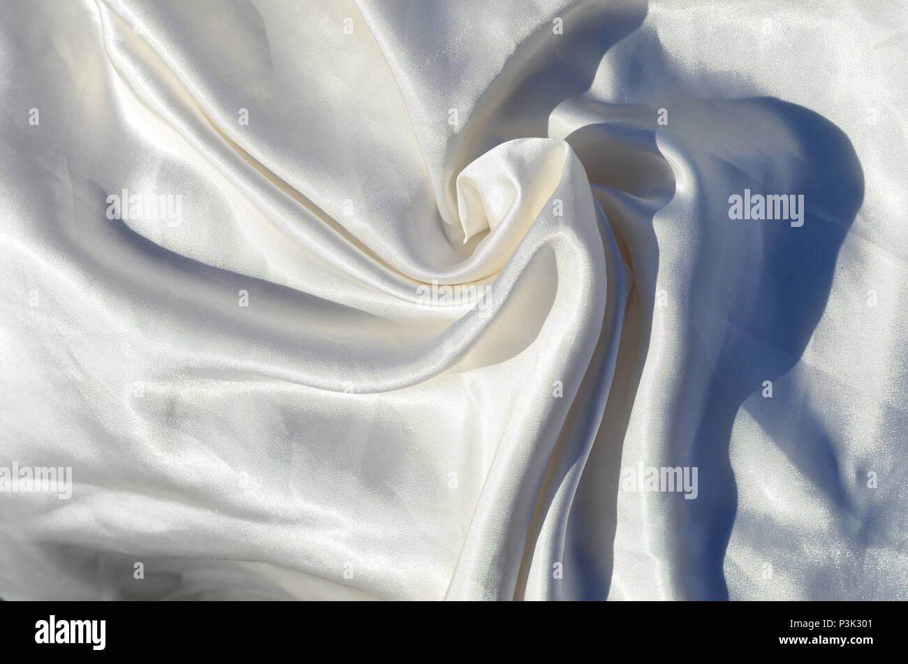 Smooth elegant white silk or satin luxury cloth texture can use as ...