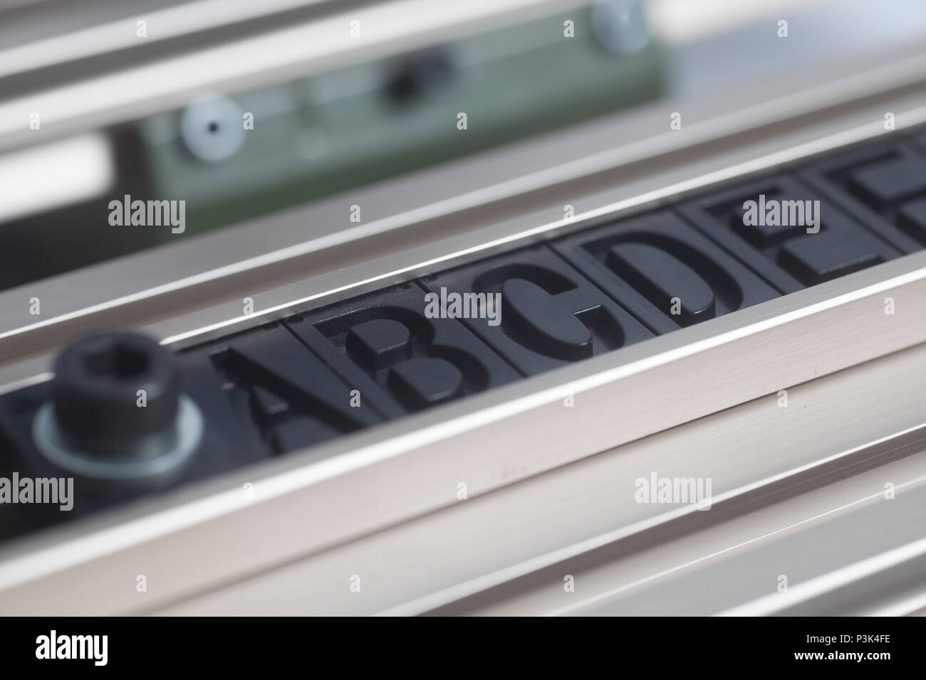 Engraving device pantograph with letterpress alphabet closeup Stock ...